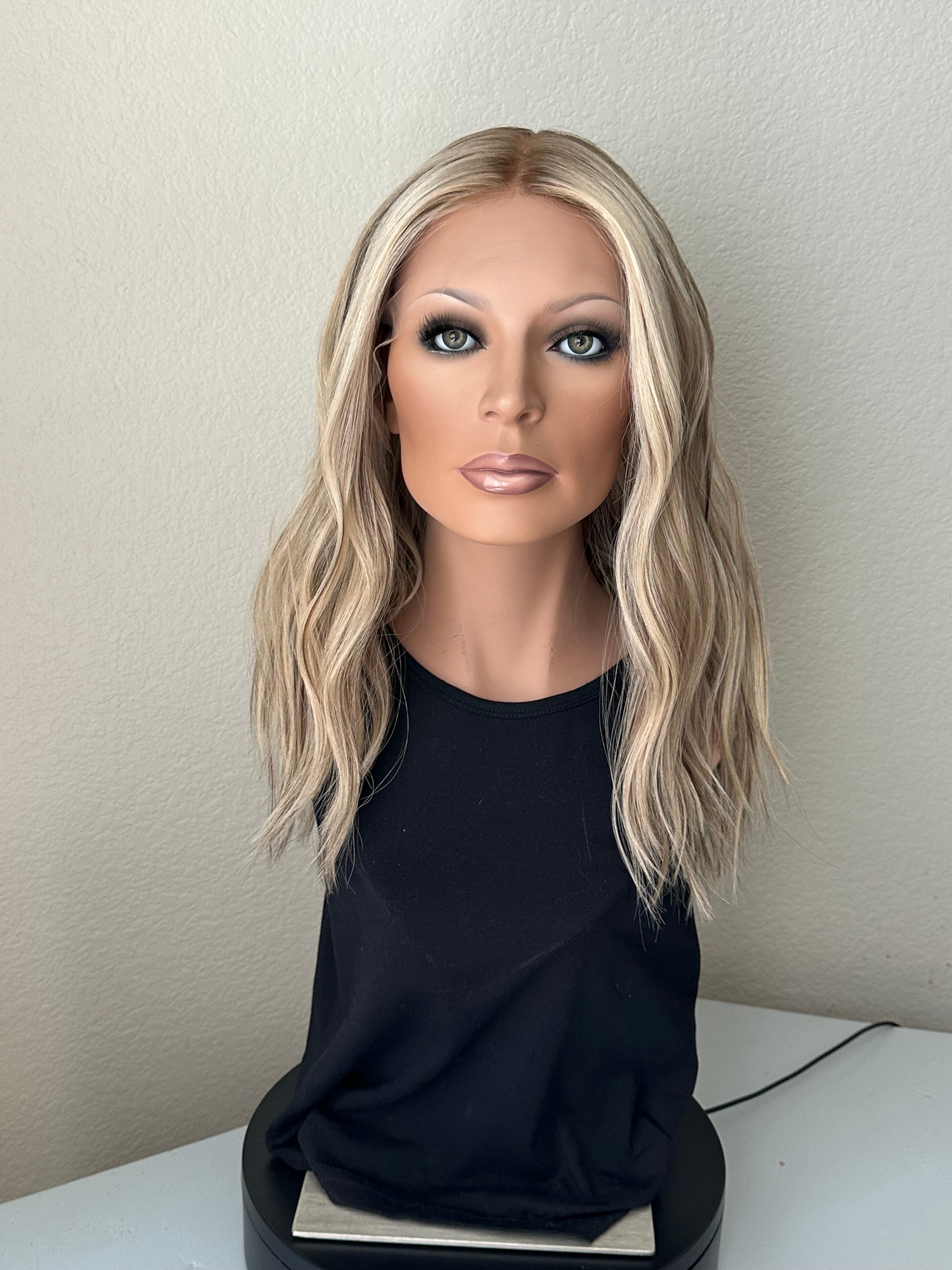 Helena is a 21" layered length, medium cap made with premium Euro qual ...