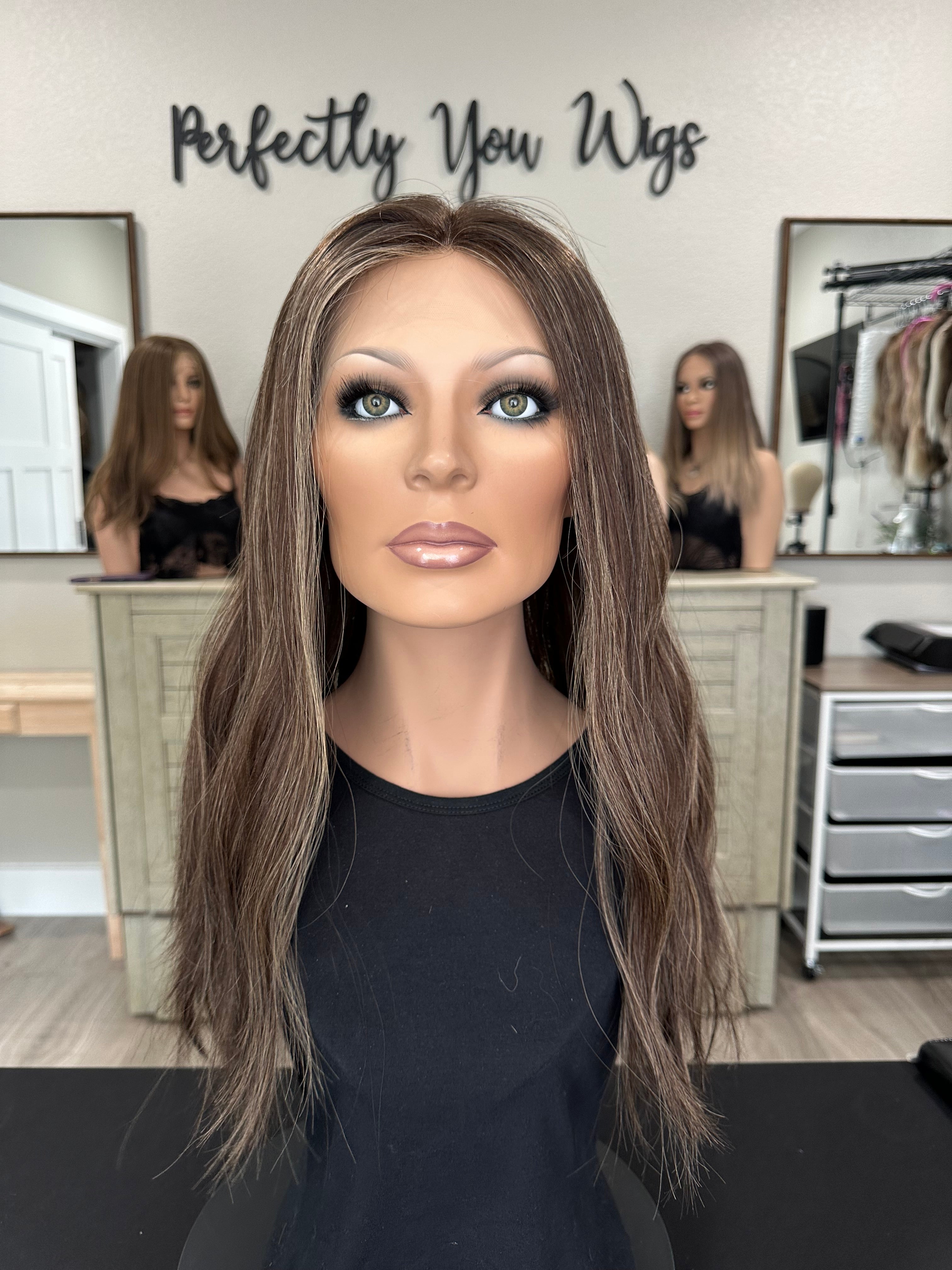 Dorothy is a 23” layered length, medium hand tied stretch cap with lac ...